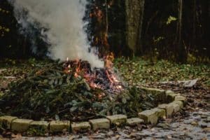 9 Easy Ways to Reduce Smoke in Your Fire Pit - The Backyard Pros